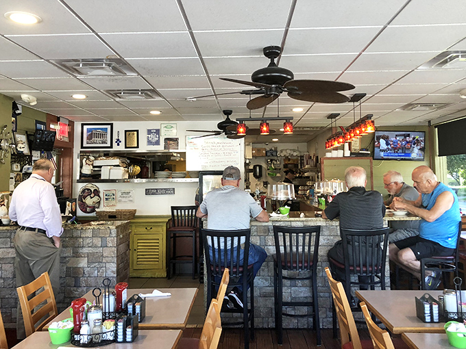 The counter seats are where the real Orlando stories unfold – business deals, retirement plans, and debates about last night's game.