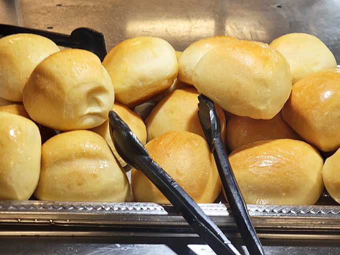 Hot, pillowy clouds of carbohydrate heaven. These dinner rolls aren't just side dishes—they're edible spoons for sopping up every last drop of gravy.