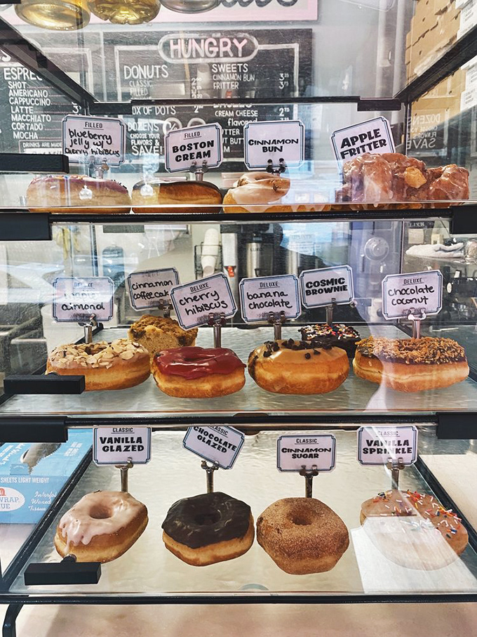 This display case is basically the Louvre of donuts – each piece a work of art worth admiring.