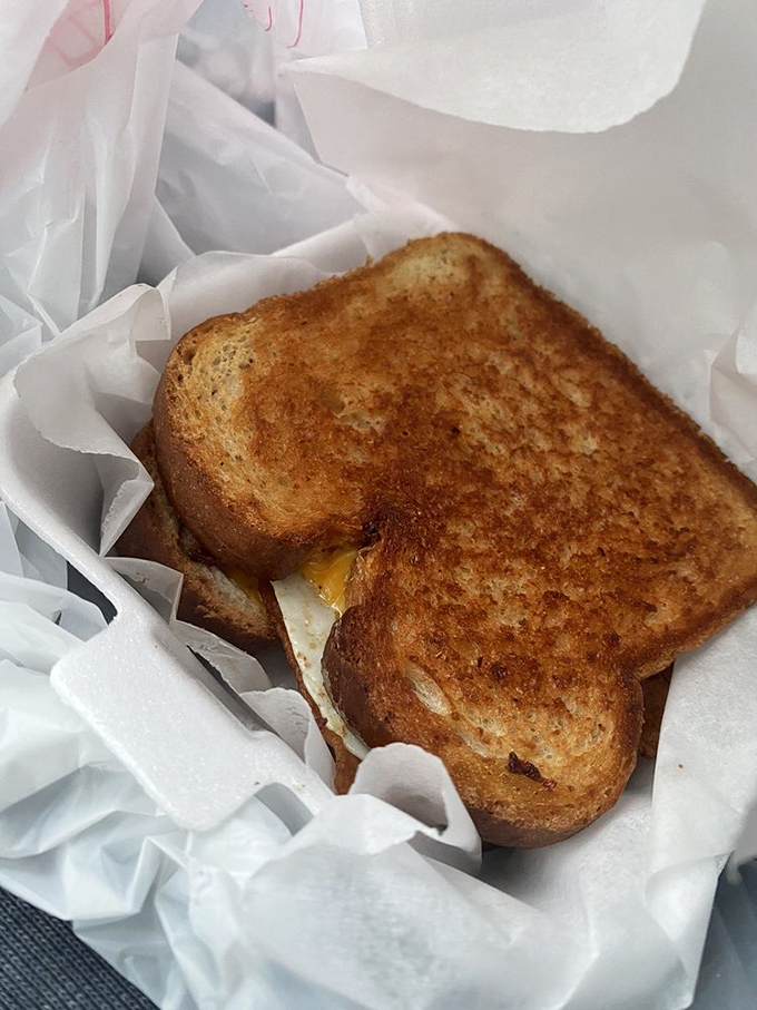 This isn't just a grilled cheese—it's comfort wrapped in golden-brown bread, the kind that makes you wonder why fancy restaurants even exist.
