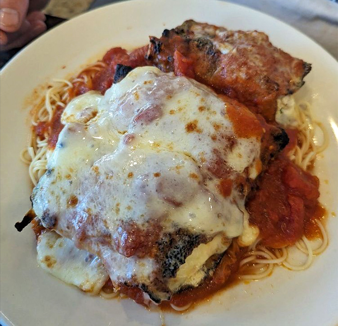 This isn't just pasta—it's an Italian grandmother's love letter to your taste buds, complete with melted cheese postscript.