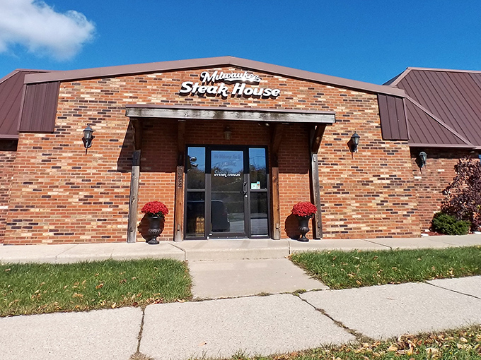 The entrance promises no gimmicks, just honest-to-goodness steakhouse excellence. Those planters aren't just decorative—they're a commitment to hospitality.