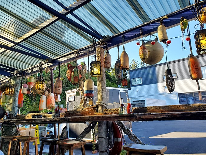 Fishing floats transformed into hanging art—proving that in Newport, even the decorations have had careers at sea before retiring to restaurant life.