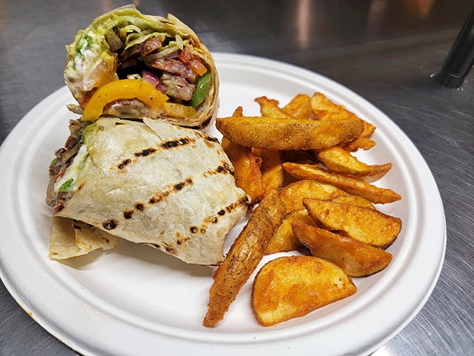 This wrap isn't just filled, it's strategically packed—a portable flavor bomb that somehow manages to stay intact until the very last bite.