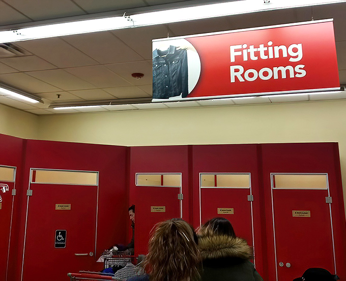 The fitting room corridor – that sacred space where fashion dreams either soar or crash against the harsh reality of fluorescent lighting.