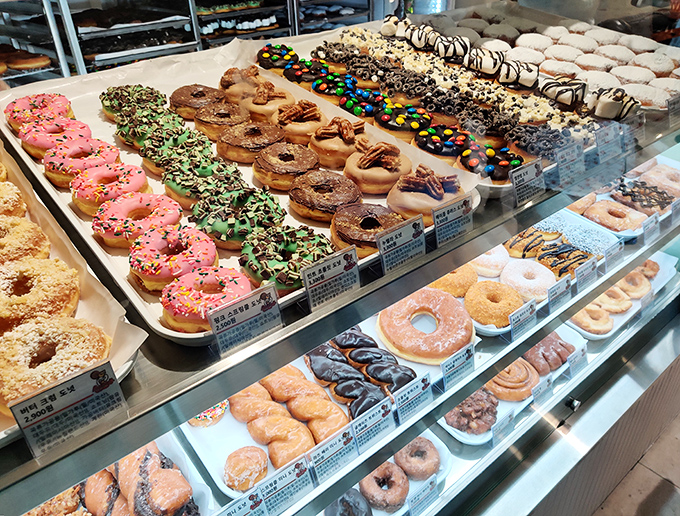 A glass case of emotion. This display would make Pavlov's dogs weep with joy – rows of colorful, perfectly arranged rings of happiness.