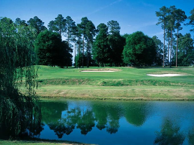 The clubhouse at Georgia Veterans State Park looks like it belongs on a postcard—one you'd send with "wish you were here" and actually mean it.