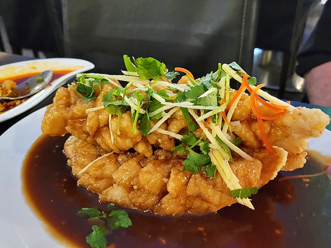 This golden-fried fish, garnished with fresh herbs, is the Beyoncé of the buffet – it knows it's fabulous.