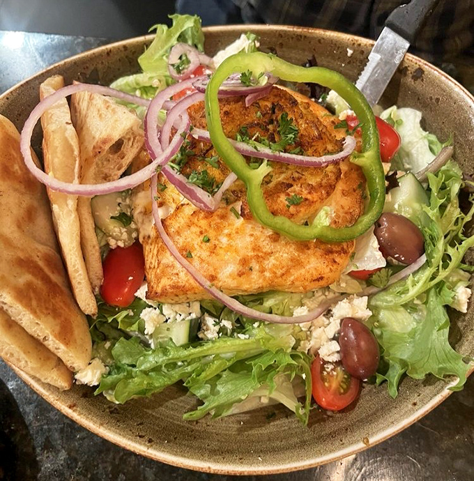 This Greek salad with salmon is what happens when the Mediterranean diet decides to dress up for a night out in Pennsylvania.