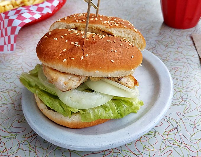 This chicken sandwich doesn't need fancy aioli or brioche to impress—it lets honest ingredients and proper execution do all the talking.