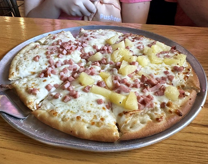 Hawaiian pizza that would make a purist weep, but in the good way—pineapple belongs here, fight me.