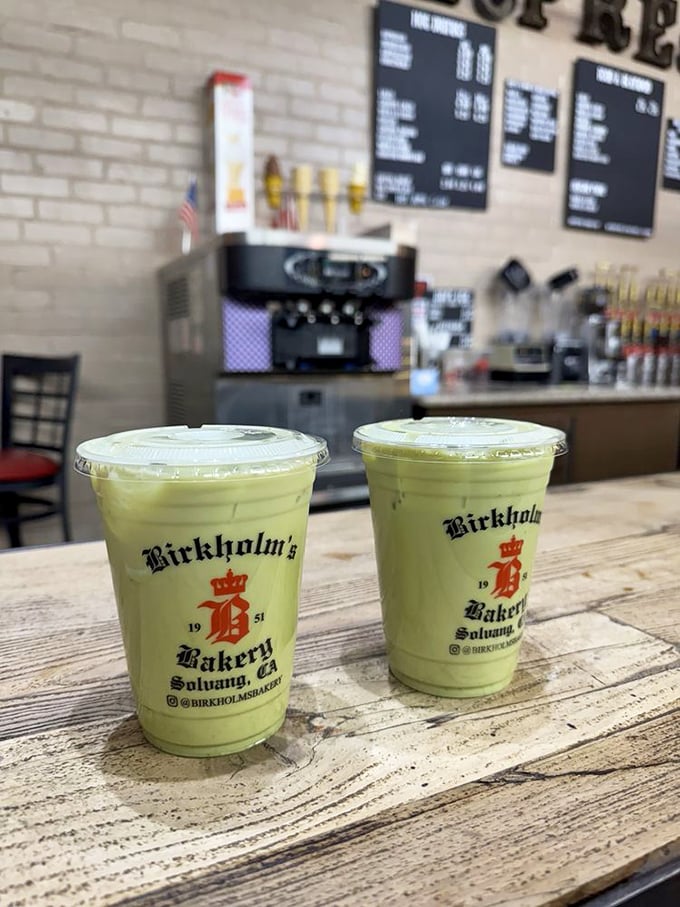 Matcha lattes with the bakery's logo – because sometimes you need something to wash down your third Danish pastry of the morning.
