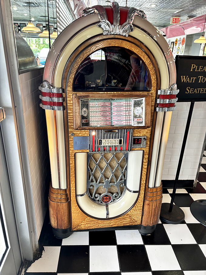This isn't just a jukebox—it's a time portal disguised as a music machine. Five plays for a dollar and instant transportation to simpler times.