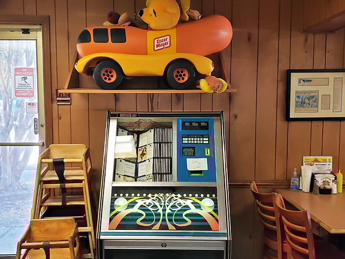 That vintage jukebox and hot dog bus—quirky touches that remind you the best places have personality, not just food.