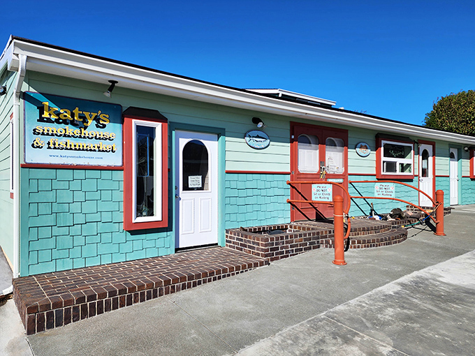 Katy's colorful façade is like a maritime mood ring—cheerful turquoise and coral hues that perfectly match its seafood specialties.