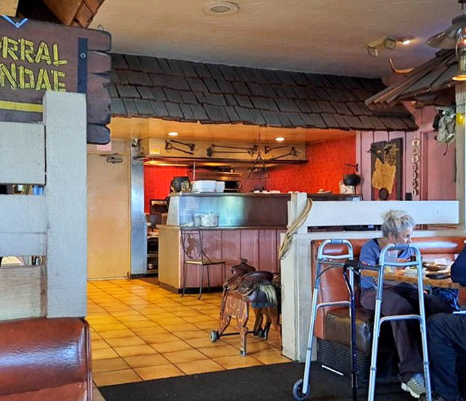 A glimpse into the heart of the operation. That saddle decoration isn't just for show—it's a symbol of the restaurant's authentic Western roots.