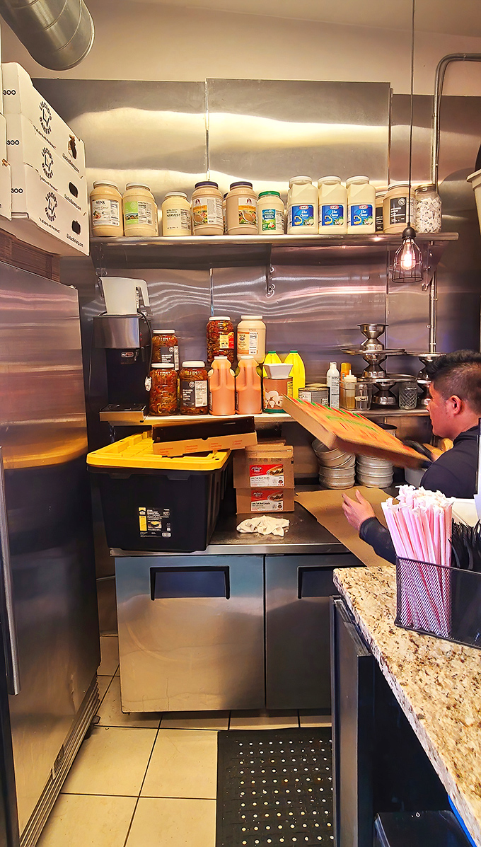 A glimpse into the kitchen reveals the organized chaos where the magic happens—no fancy equipment, just skill and consistency.