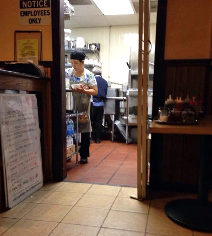A rare glimpse behind the scenes shows where the culinary alchemy happens – the heart of Sue's Kitchen beats in this modest workspace.