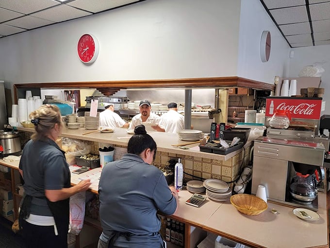 The kitchen pass—that sacred portal where plates transform from mere orders into moments of joy for waiting customers.