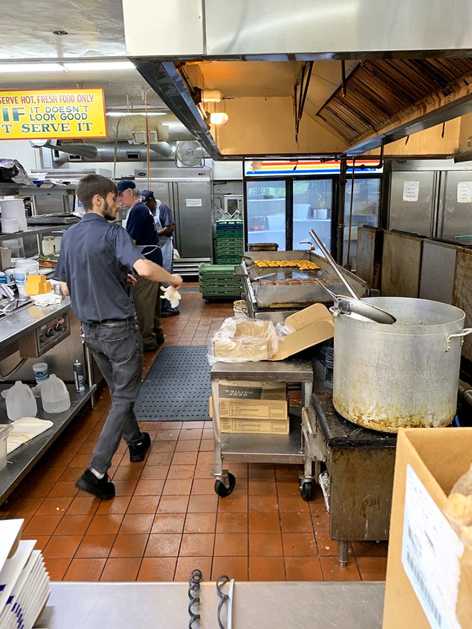The kitchen's controlled chaos follows the philosophy proudly displayed above: "If it doesn't look good, I don't serve it." Words to live by.