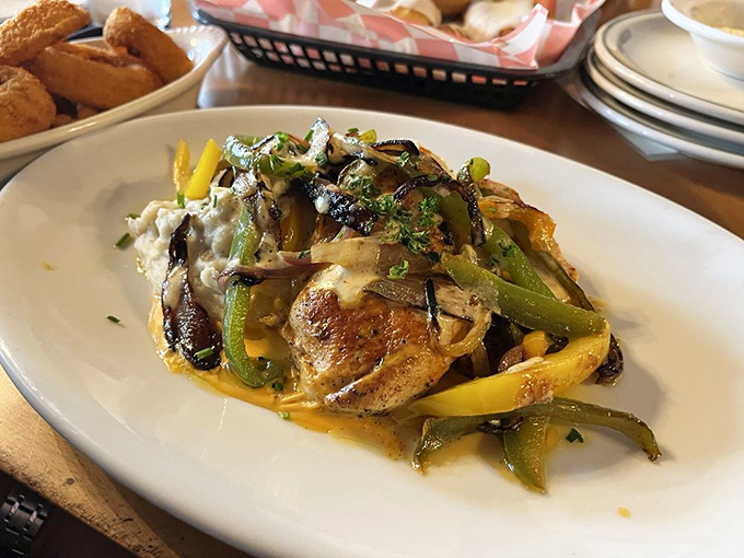 This isn't just chicken—it's a masterclass in flavor layering, with vegetables and sauce creating a dish that's both comforting and exciting.