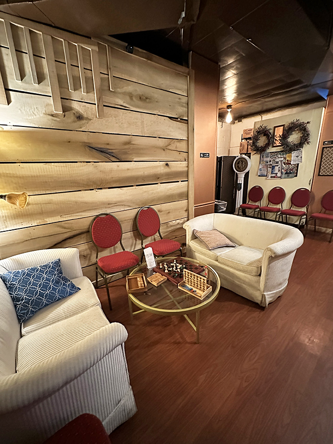 A cozy lounge area with chess set at the ready—because sometimes the best post-breakfast move is no move at all.
