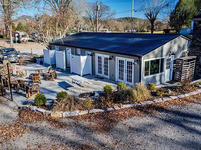 This cozy cottage with its inviting patio practically whispers, "Come sit a spell" – small-town charm with all the comforts of home.