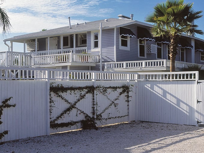 The Meranova Guest Inn offers coastal charm with its wraparound porch and white picket fence. Like staying at your stylish friend's beach house—if your friend had impeccable taste.