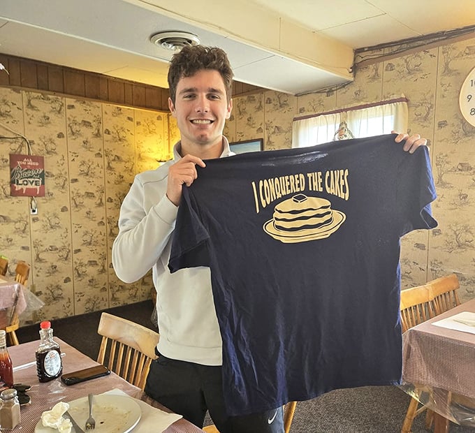 Another pancake conqueror joins the hall of fame. That shirt isn't just merchandise—it's a trophy you can wear.