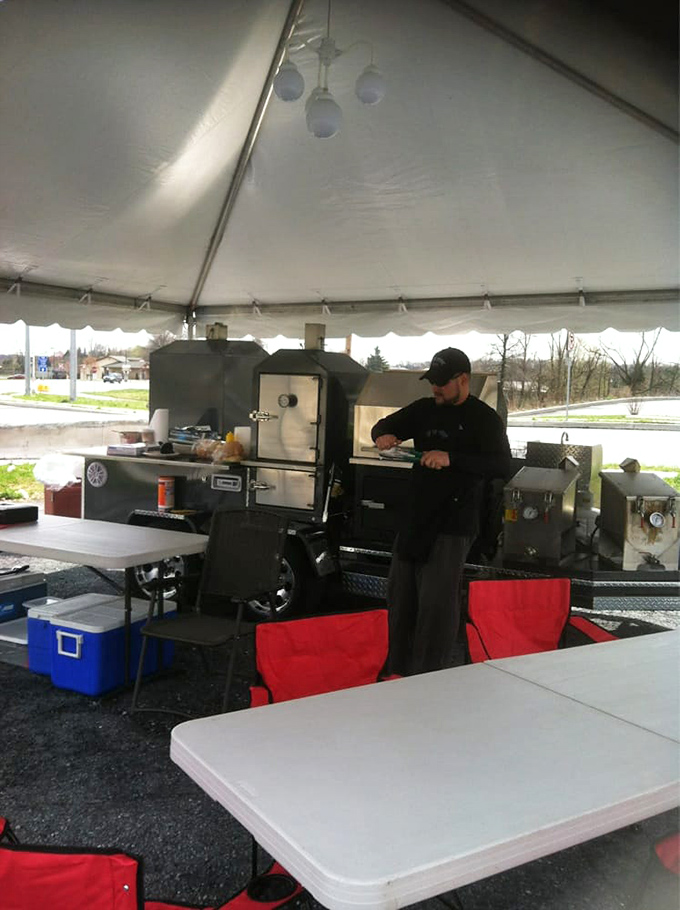 The mobile smoker setup proves great barbecue isn't confined to four walls – smoke knows no boundaries.