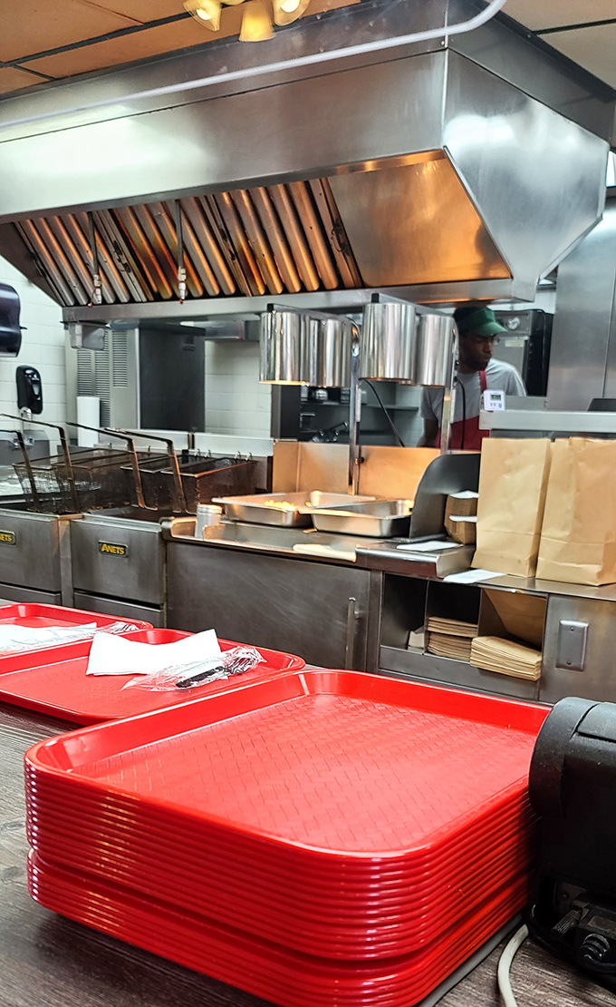 A glimpse behind the curtain. The kitchen at Benjamin's isn't hiding anything—just honest cooking with equipment that's earned its patina.