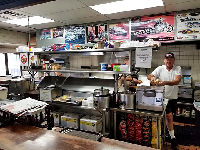 No fancy kitchen theatrics here—just decades of sandwich-making expertise at work. Sometimes the best shows are the simplest.