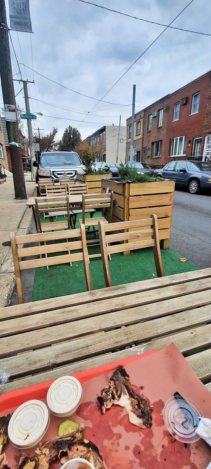 The outdoor seating area offers a front-row seat to South Philly life—and a place to contemplate the meaning of perfectly smoked meat.