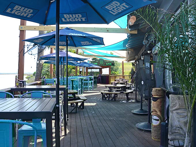 Al fresco dining that makes indoor restaurants seem like punishment. Those turquoise tables under Bud Light umbrellas are calling your name.