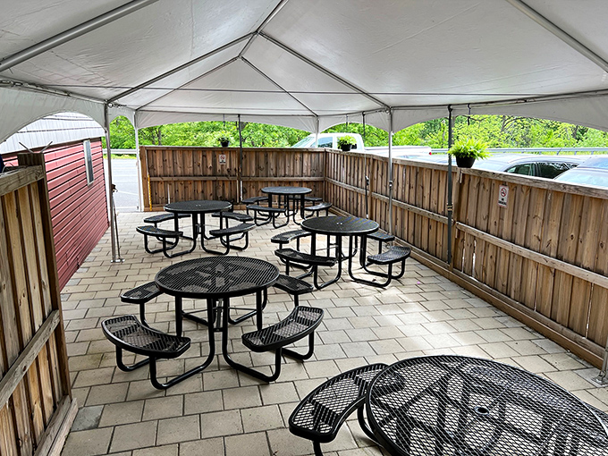 The outdoor seating area: where fresh air meets comfort food, and nobody judges you for ordering dessert before noon.