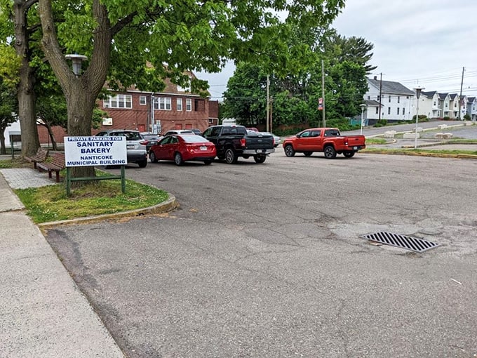 The unassuming parking area outside Sanitary Bakery – where cars arrive with empty trunks and depart with boxes of Pennsylvania's finest.