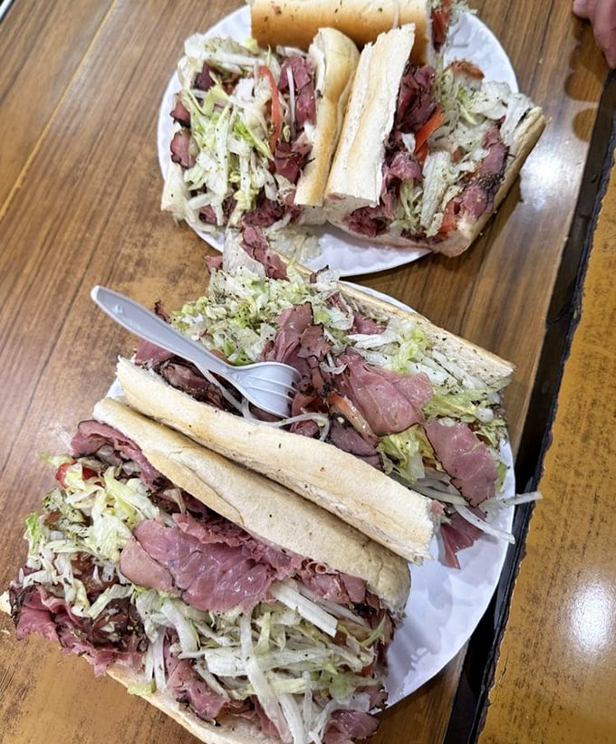 The pastrami battleship isn't just a sandwich—it's an edible monument to excess that makes Manhattan delis tip their hats in respectful acknowledgment.