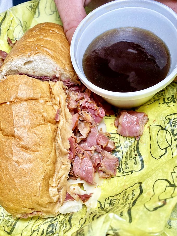 The Pastrami Dip with its cup of savory jus—a sandwich so good it deserves its own dipping pool.