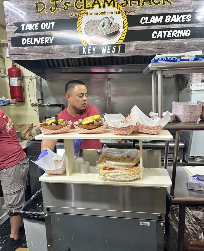 The kitchen pass: where seafood dreams become delicious reality before making their way to hungry patrons just feet away.