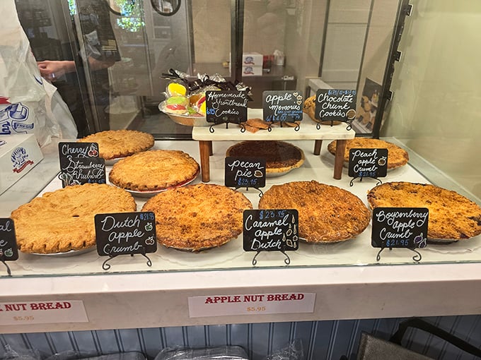 The pie case—a museum of edible art where each creation sits proudly labeled, tempting you to try "just one more flavor."