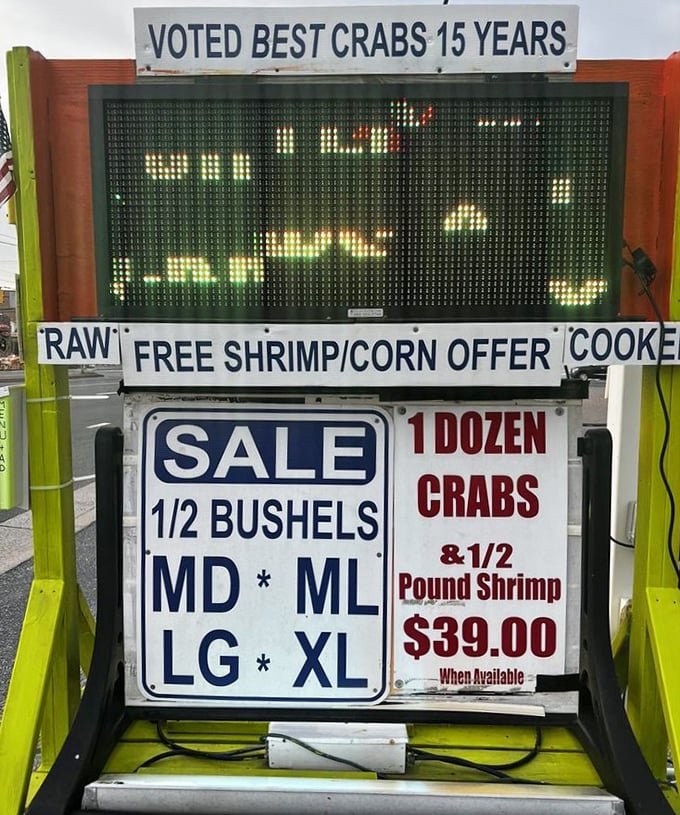 "Voted Best Crabs 15 Years" isn't just a sign—it's a legacy. This electronic board announces daily specials with no-nonsense authority.