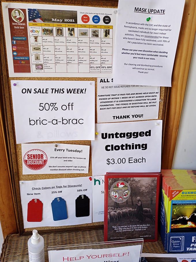 The bulletin board of bargains! These colorful notices reveal the secret language of thrifting—50% off bric-a-brac means double the treasures.