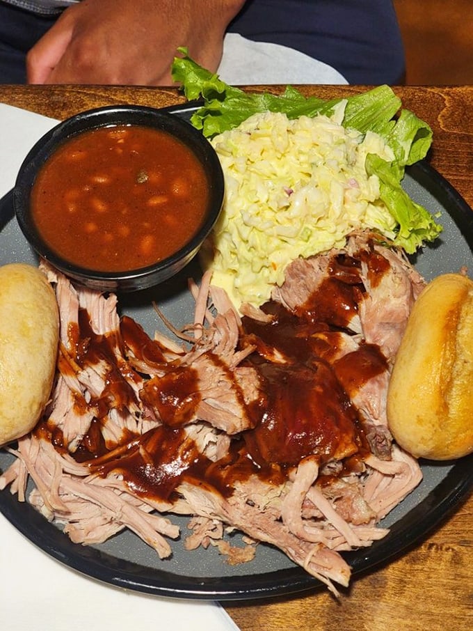 Pulled pork that's had a proper Southern upbringing—tender, saucy, and knows how to behave on a plate with its side dish friends.