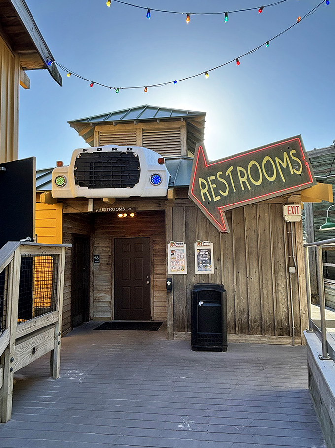Even the path to the restrooms at Floyd's embraces whimsy – where else would a truck front serve as bathroom decor?