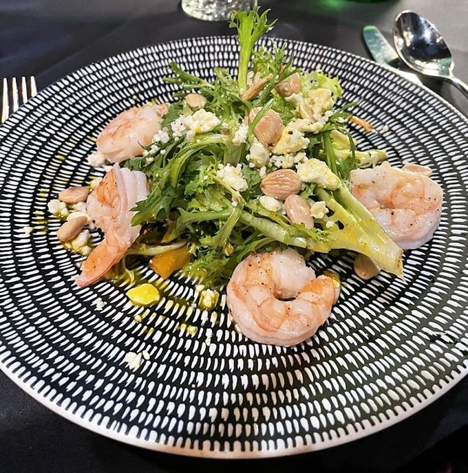 A salad that's having an identity crisis in the best possible way—part garden, part ocean, all delicious with those perfectly cooked shrimp.