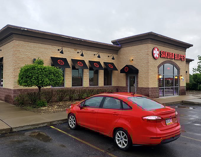Even on a rainy day, Sakura Buffet's bright red awnings promise a culinary journey that requires no passport—just an appetite for adventure.