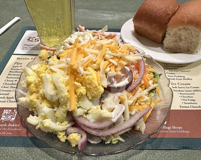 This isn't just a salad—it's a carefully engineered tower of cheese, egg, and vegetables that somehow makes rabbit food exciting.