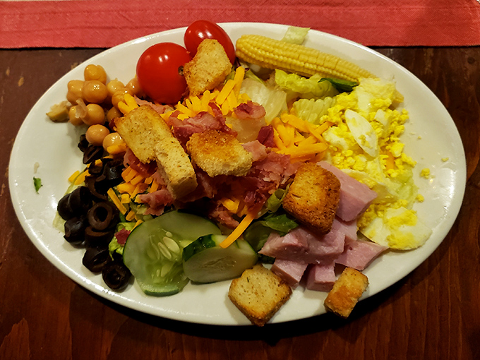 The salad bar's greatest hits album, featuring everything from black olives to bacon bits—proof that vegetables can party too when properly dressed.
