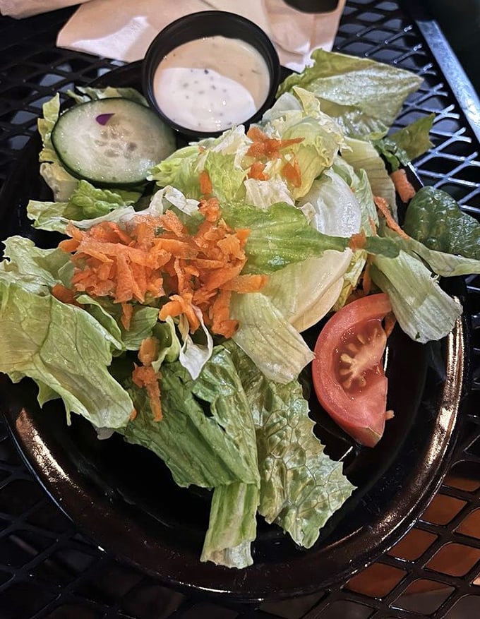 Even the salad at Whitey's means business—fresh greens, vibrant veggies, and house dressing that makes eating vegetables feel like cheating.