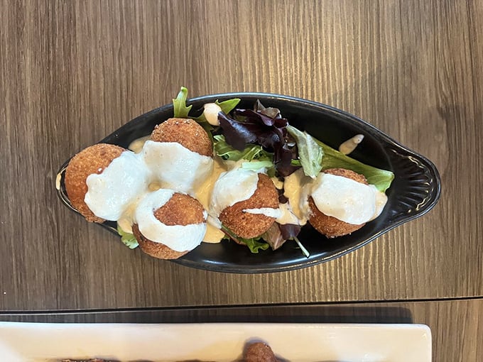 These golden-fried sauerkraut balls with creamy dipping sauce are Ohio's answer to arancini—crispy outside, tangy inside, and completely addictive all around.